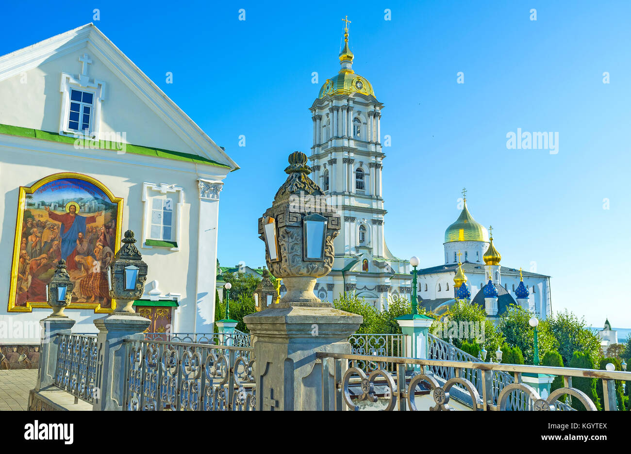 Beautiful stone streetlights with modern lamps located on balustrade ...