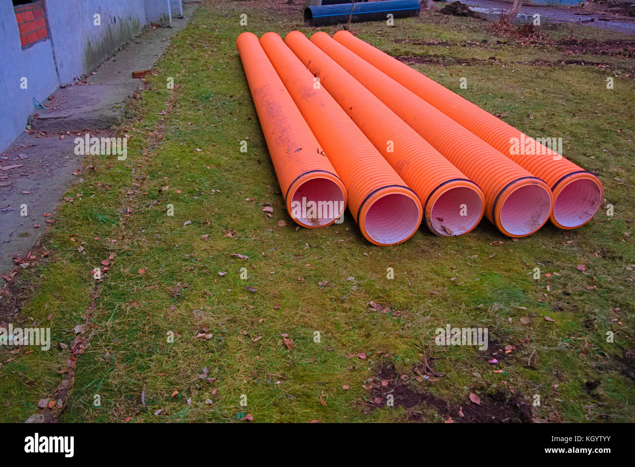 Pipes of PVC large diameter prepared for laying on construction site ...