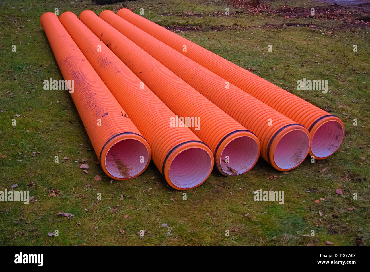 Pipes of PVC large diameter prepared for laying on construction site ...