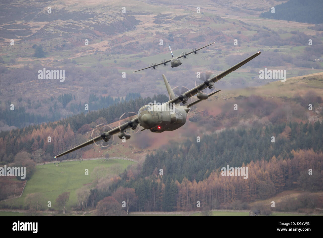 Royal Air Force two ship Hercules Flight conducting low flying training ...