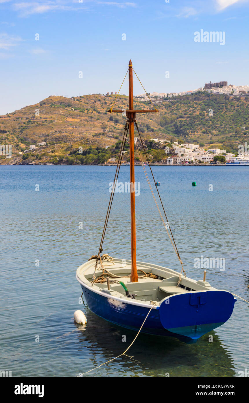 A boat with a mast in the shape of a cross with the Monastery of Saint ...