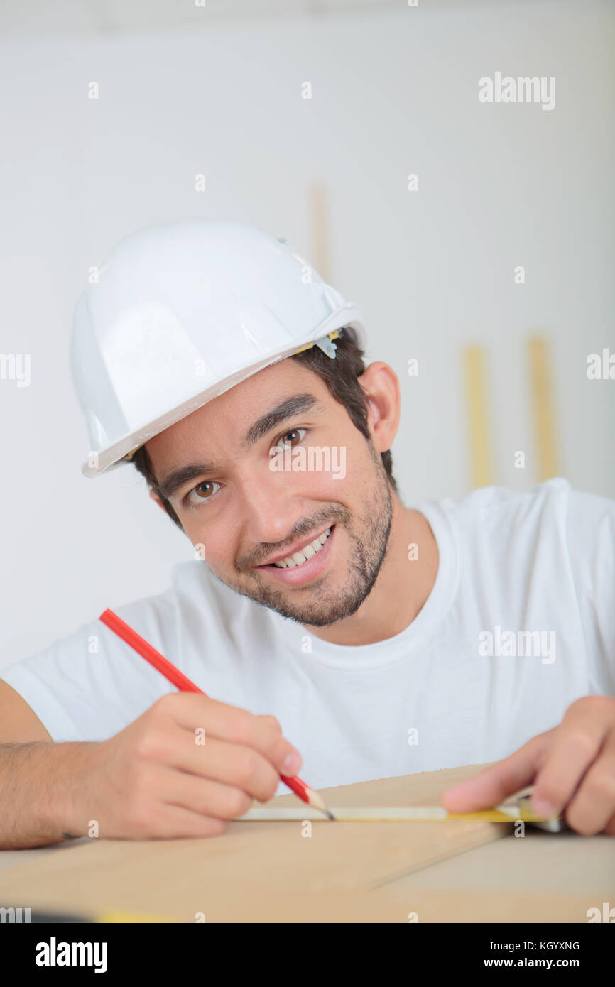 measuring the plywood Stock Photo - Alamy
