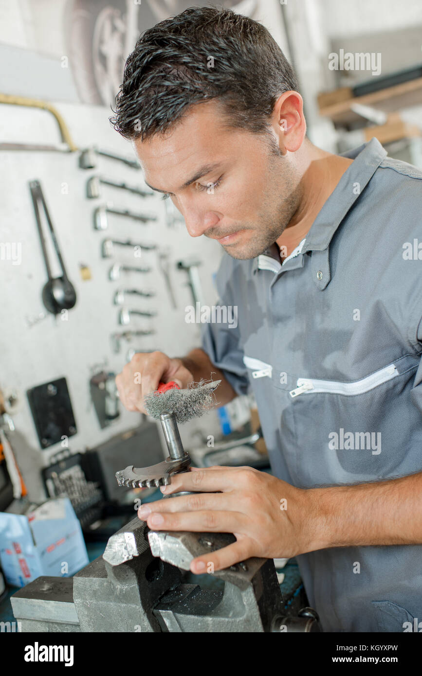 Repairing a car part Stock Photo - Alamy