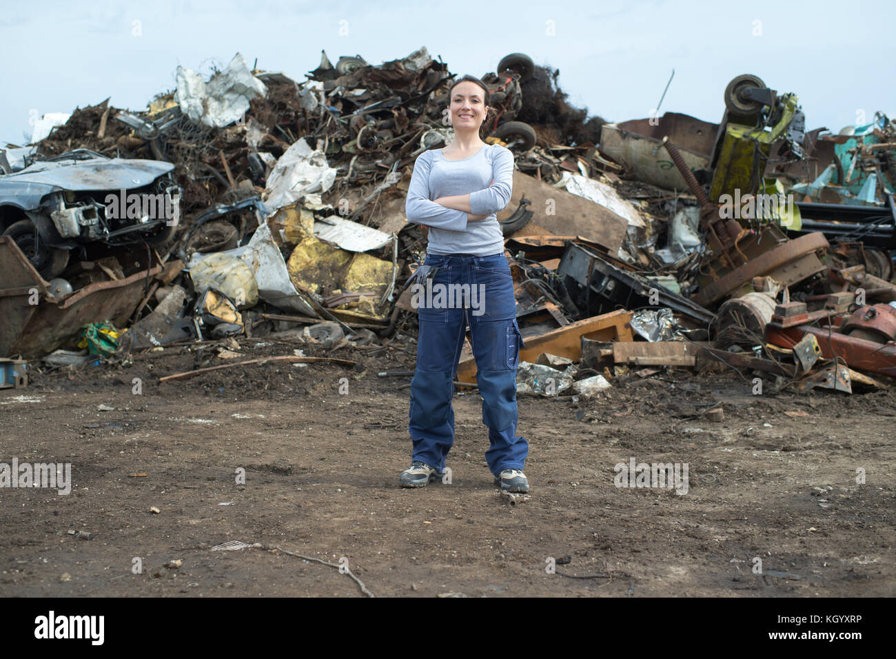 Portrait of female scrap yard worker Stock Photo - Alamy