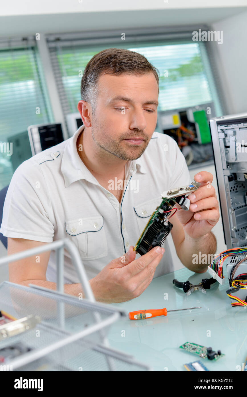 Man holding computer cables hi-res stock photography and images - Alamy