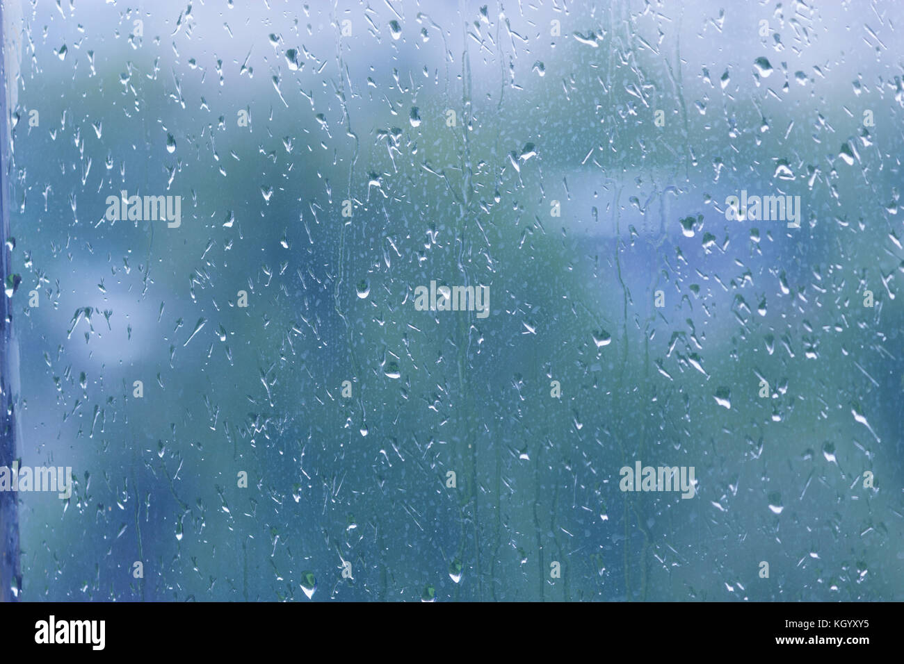 rainy window blur. water drops on glass Stock Photo - Alamy