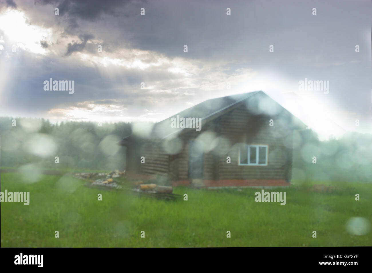 An old house on the prairie. rain. blur Stock Photo - Alamy
