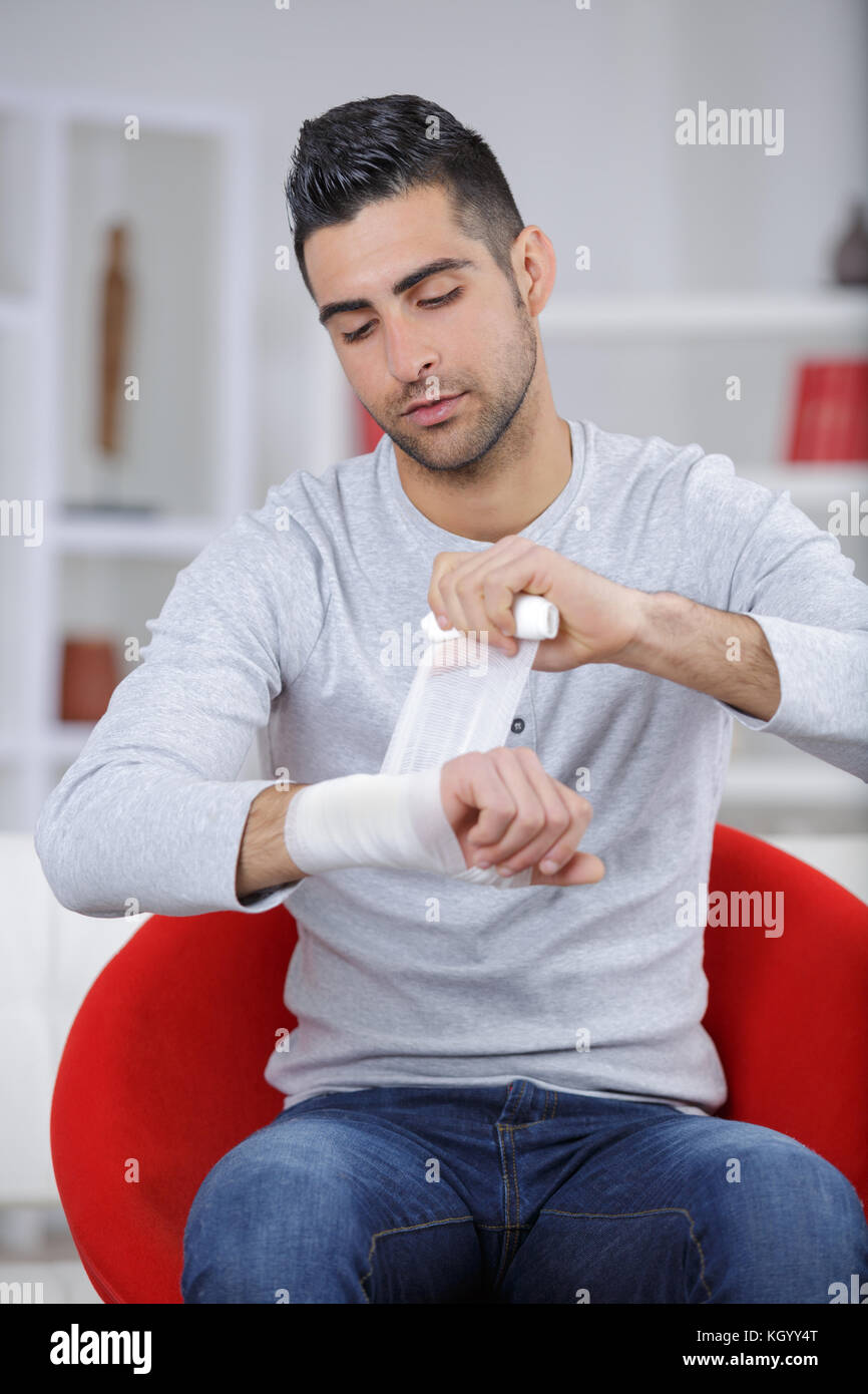 Man with bandaged wrist hi-res stock photography and images - Alamy