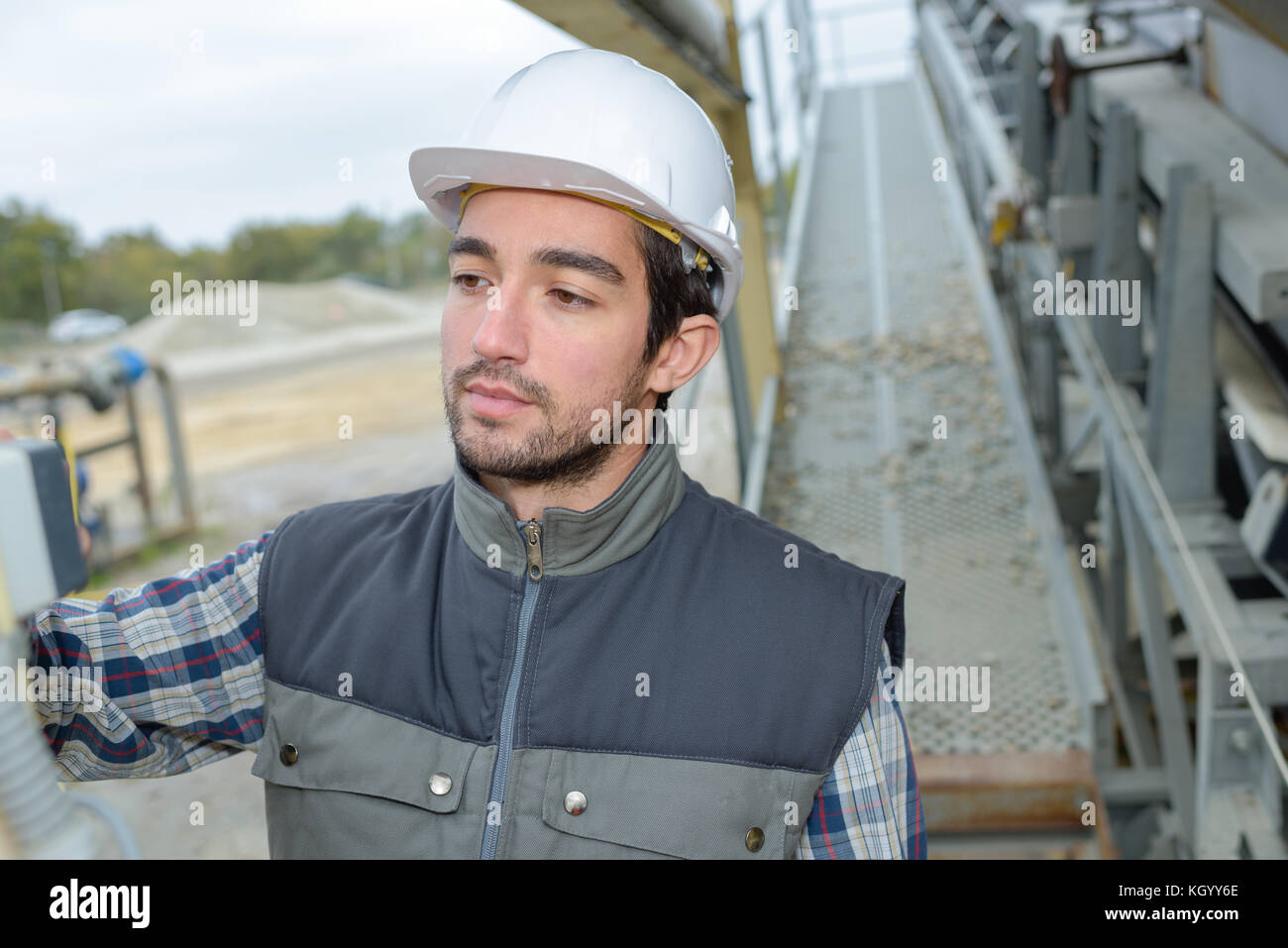 friendly happy warehouse worker outdoors Stock Photo - Alamy