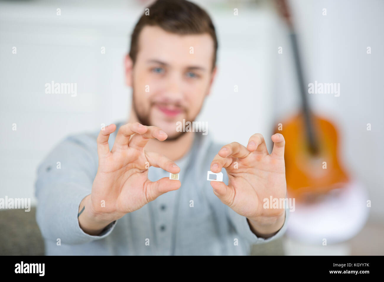 business man showing sim cards Stock Photo - Alamy