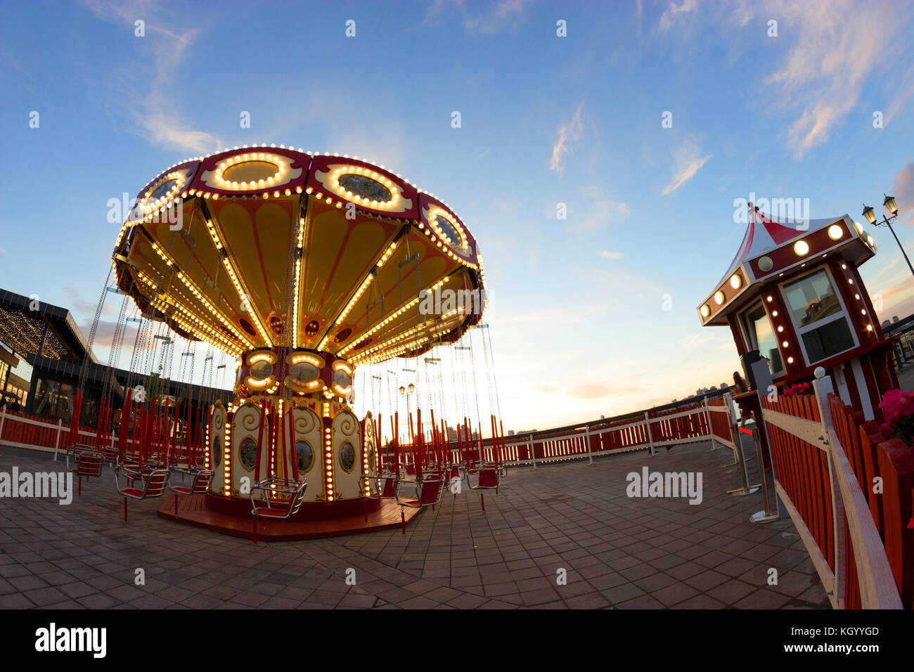 red illuminated french carousel in amusement park for childerent Stock ...