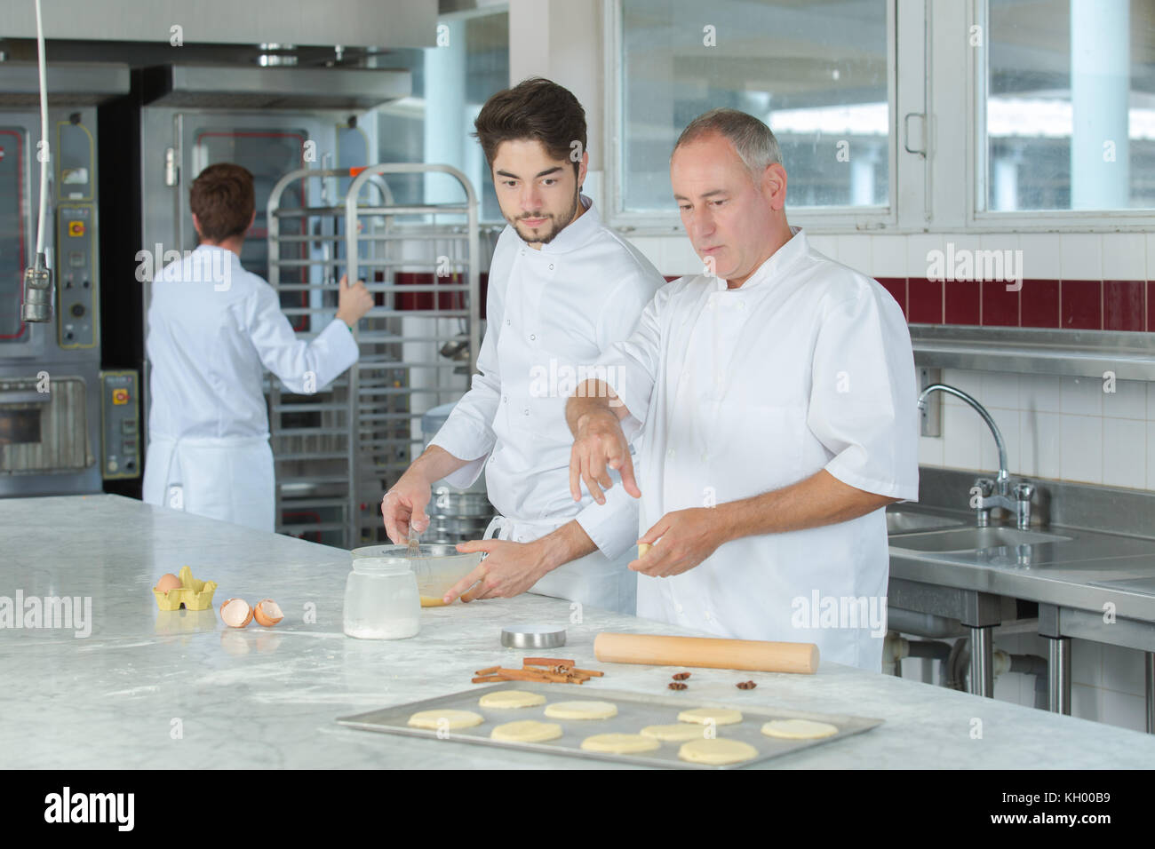 cooking lessons from the chef Stock Photo - Alamy