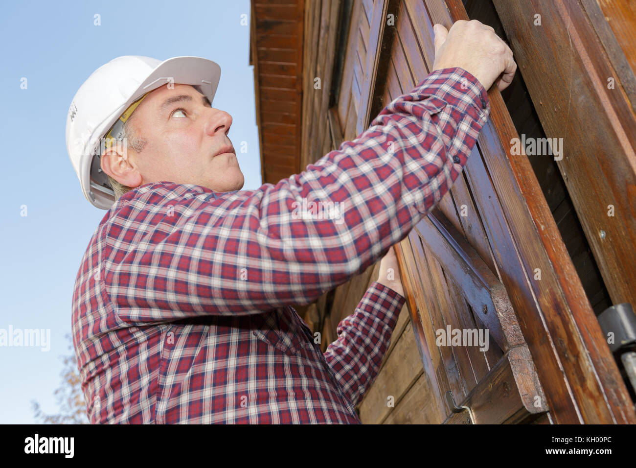 removing an old shutter Stock Photo - Alamy