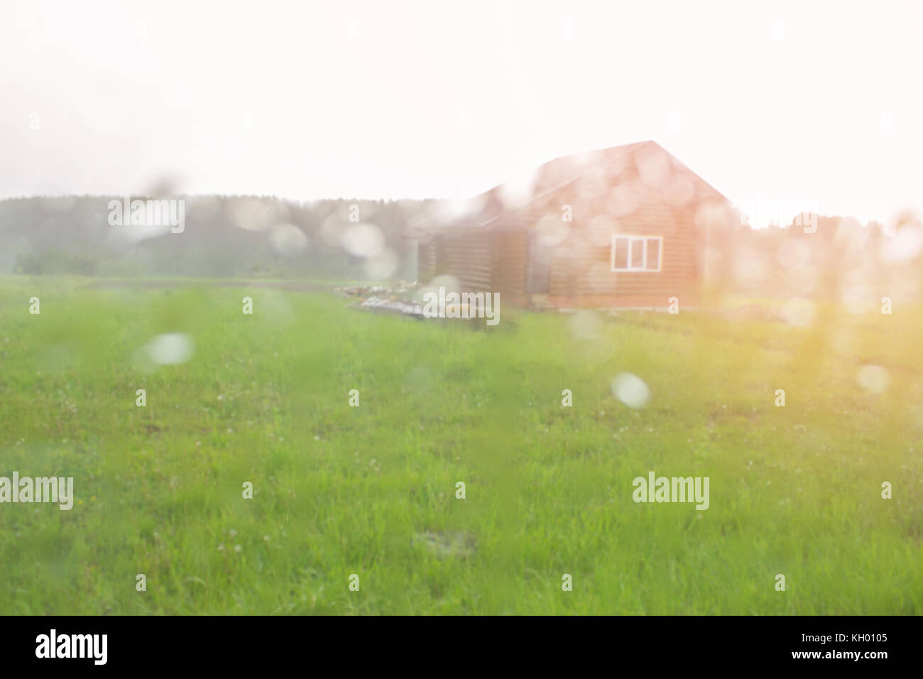 An old house on the prairie. rain. blur Stock Photo - Alamy