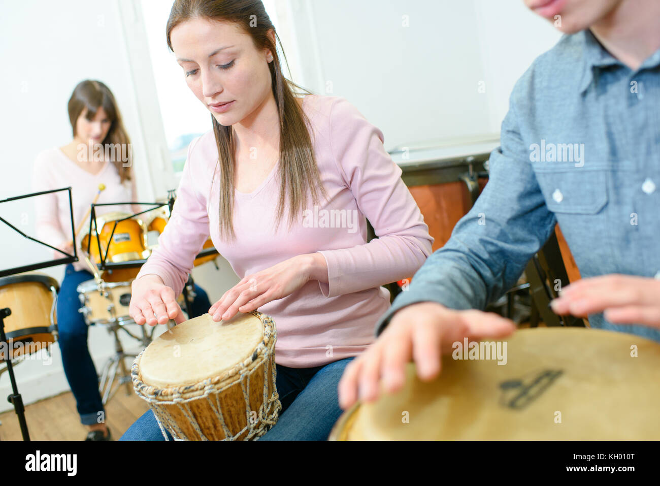 young woman in percussion class Stock Photo - Alamy