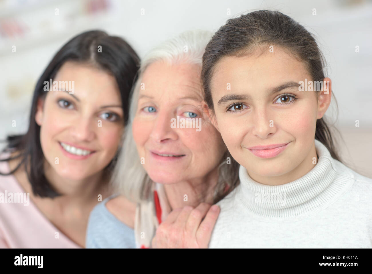 happy family of three generations smiling Stock Photo - Alamy