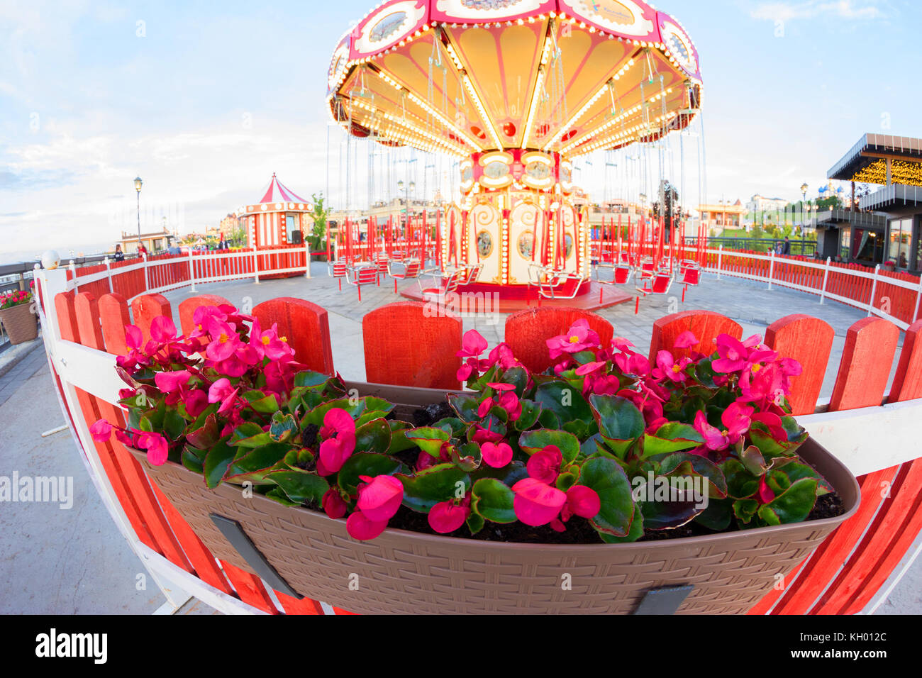 red illuminated french carousel in amusement park for childerent Stock ...