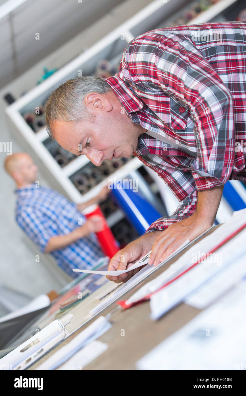 advertisement agency worker Stock Photo - Alamy