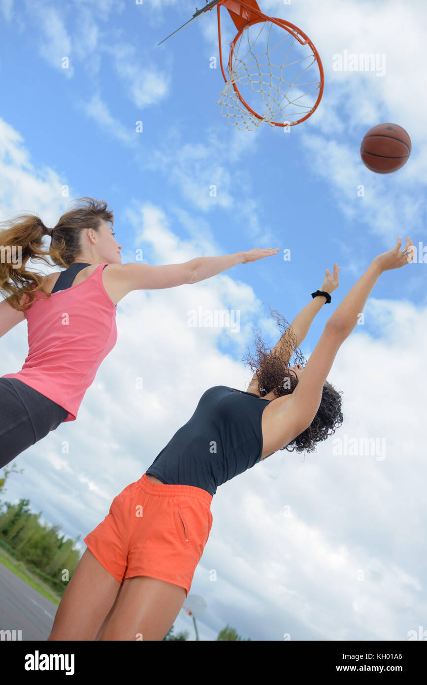 beautiful women playing basketball Stock Photo - Alamy