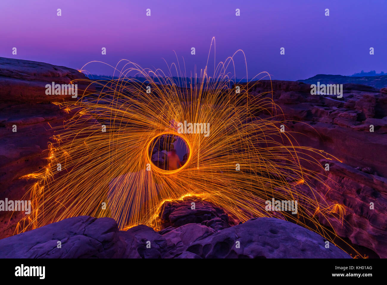 Rotation of fire works on the land of stones Stock Photo - Alamy