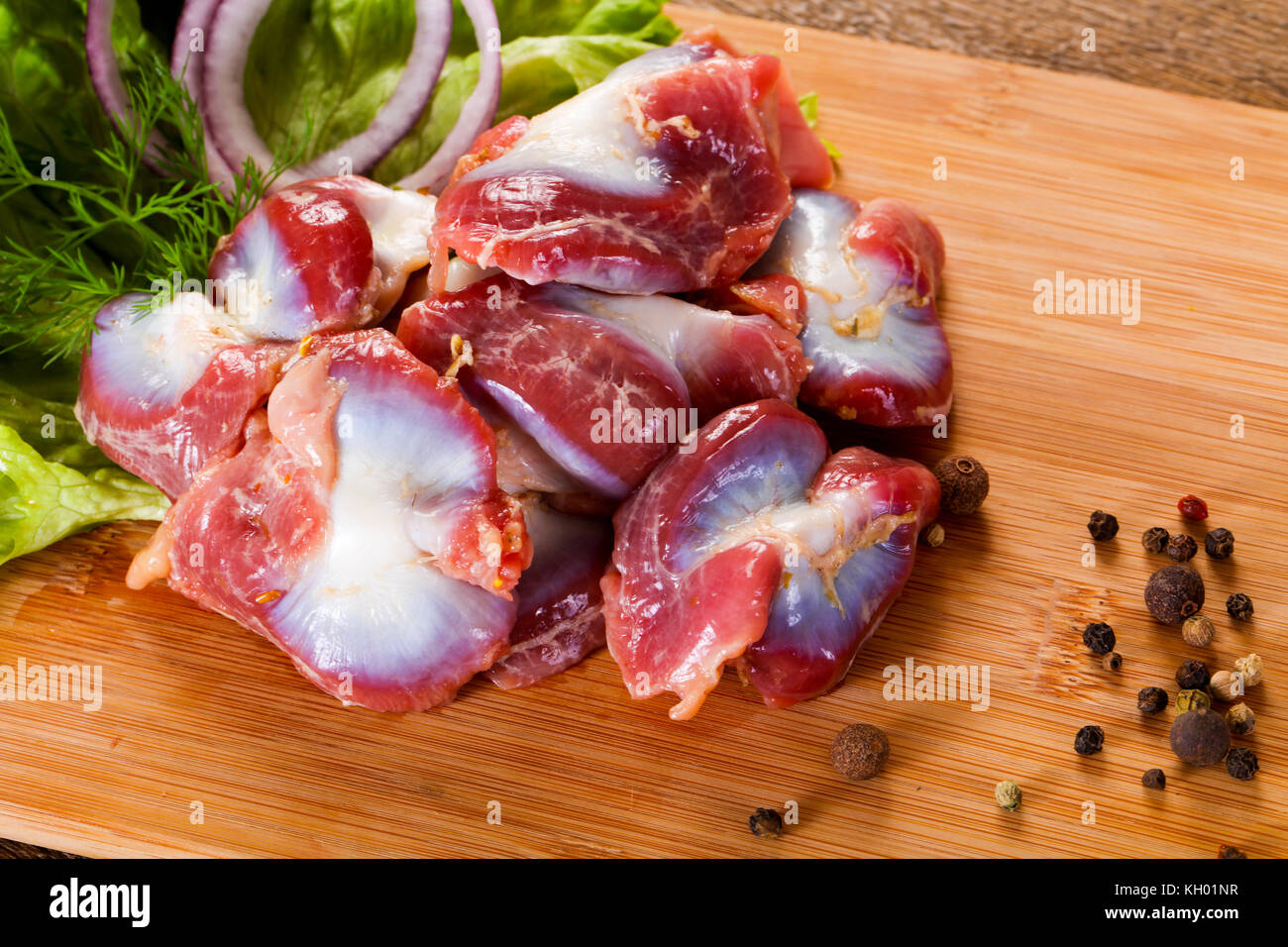Raw chicken stomach for cooking Stock Photo - Alamy