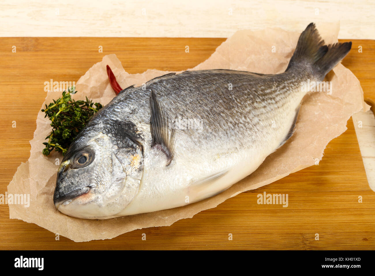 raw dorada fish - ready for cooking Stock Photo - Alamy