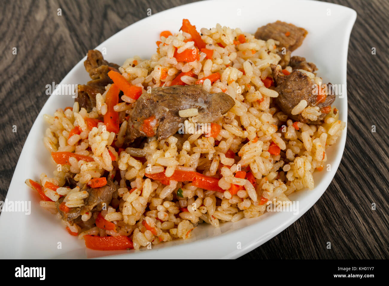 Asian rice - Plov with meat and carrot Stock Photo - Alamy