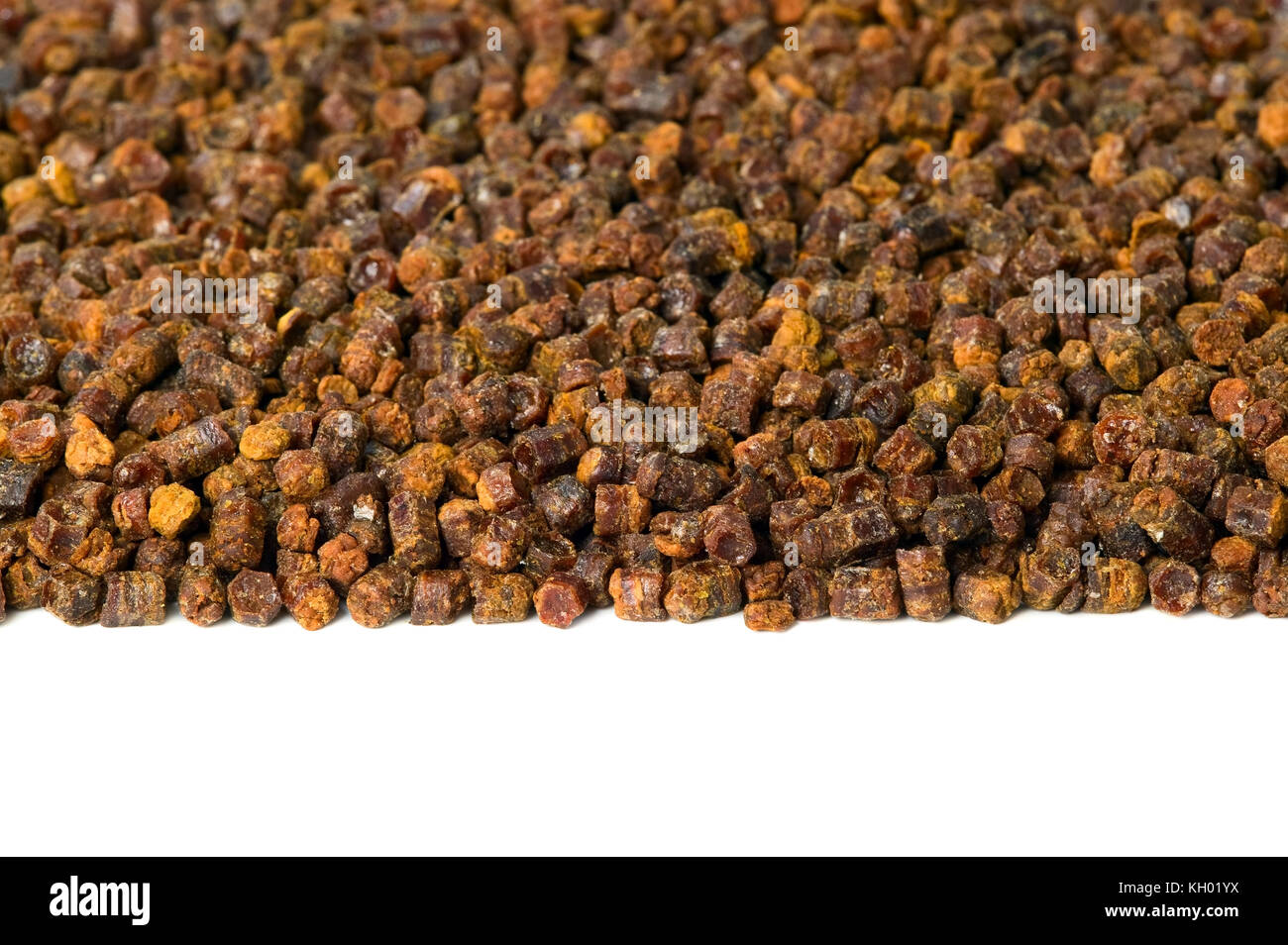 Propolis granules on white background, bee product, frame composition ...