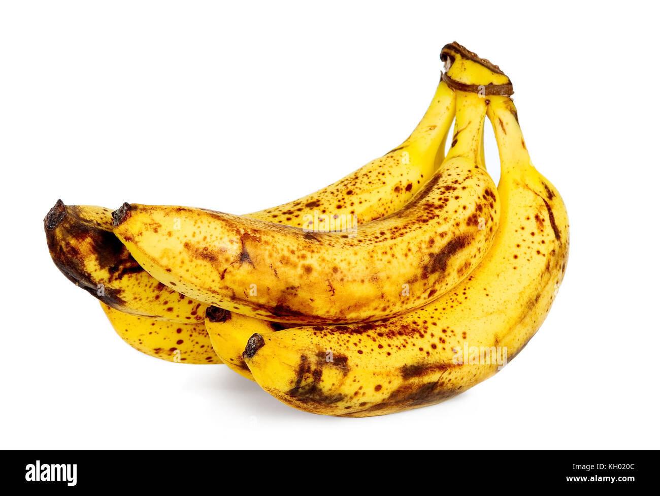 Isolated yellow over ripe bananas on white background Stock Photo - Alamy