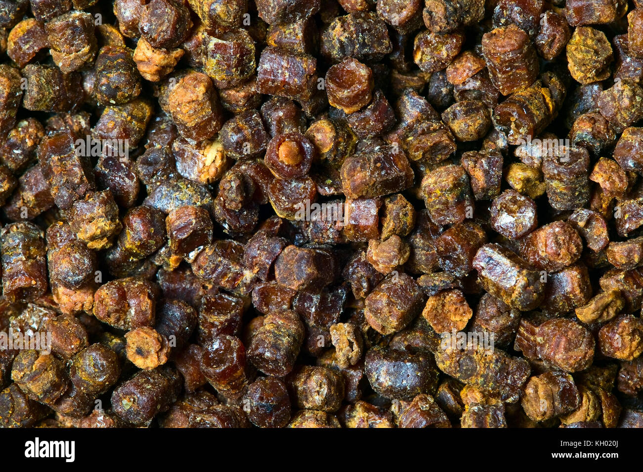 Propolis granules grunge texture background, bee product Stock Photo ...