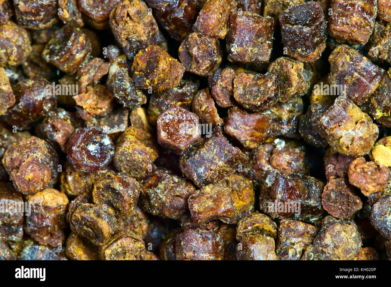 Propolis granules grunge texture background, bee product Stock Photo ...