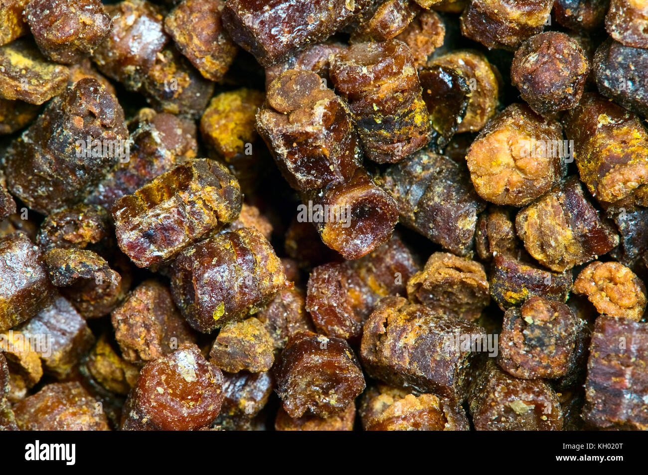 Propolis granules grunge texture background, bee product Stock Photo ...