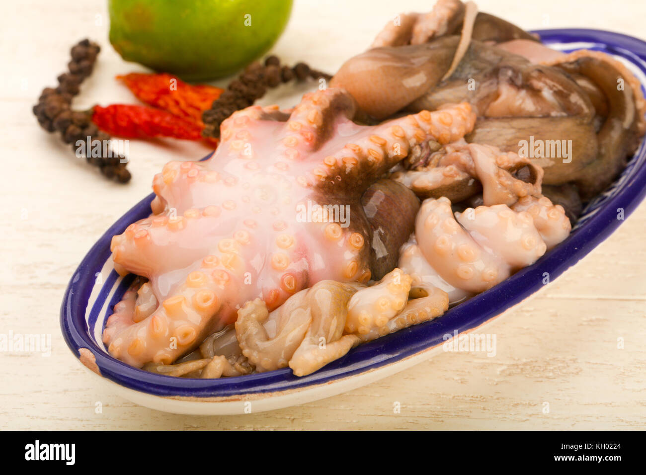 Raw octopus ready for cooking Stock Photo - Alamy