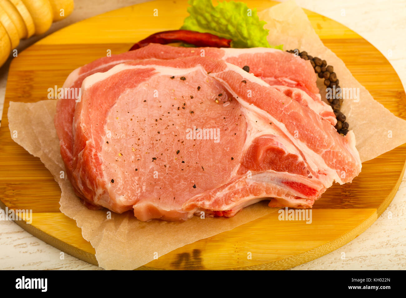 Raw pork cutlet with pepper and salt ready for cooking Stock Photo - Alamy