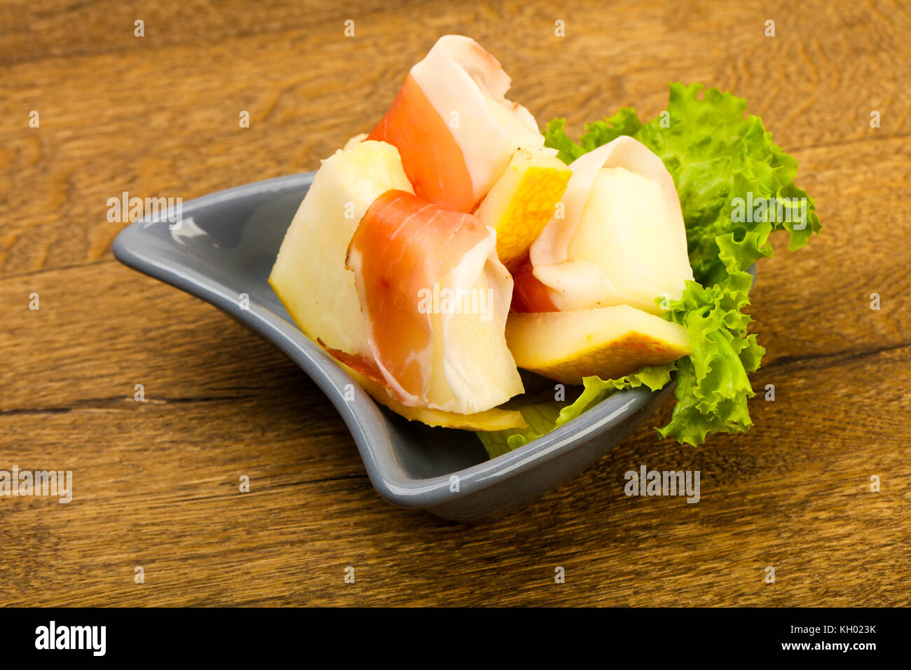 Spanish Hamon with melon Stock Photo - Alamy