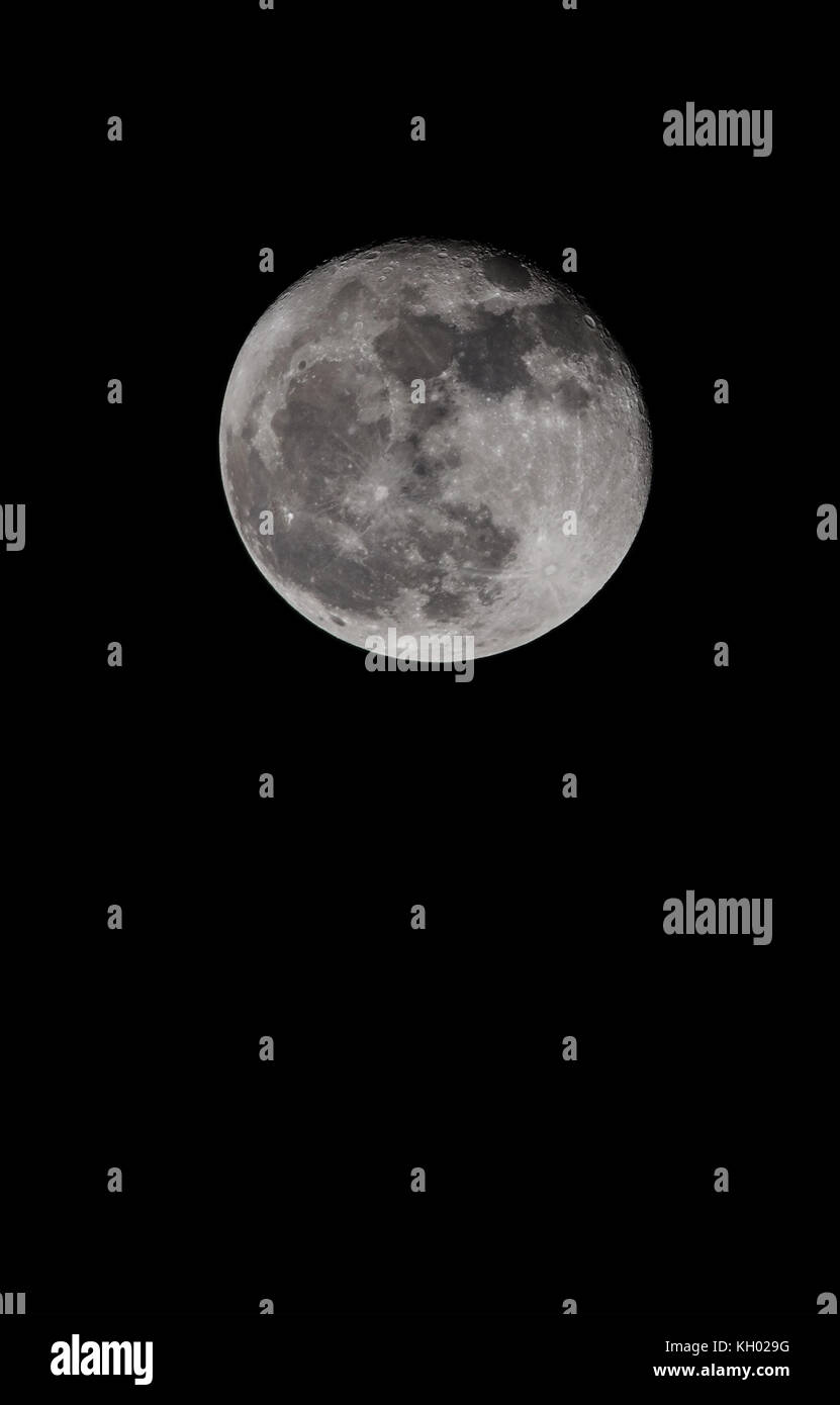 A ghostly full moon rises over the Dhaka city Stock Photo - Alamy