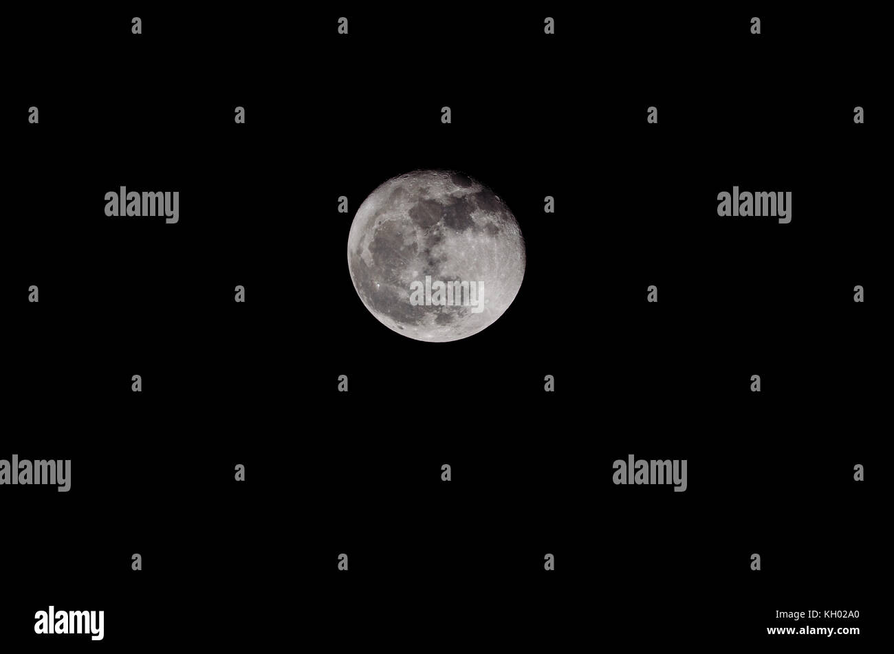 A ghostly full moon rises over the Dhaka city Stock Photo - Alamy