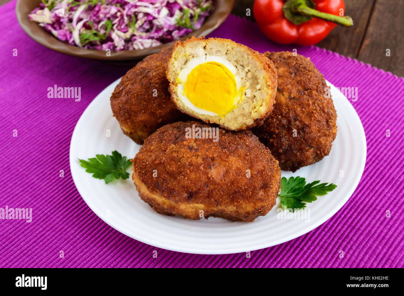Meat mini-rolls (cutlet) with boiled egg. Close up Stock Photo - Alamy