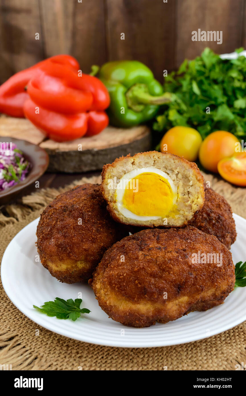 Meat mini-rolls (cutlet) with boiled egg. Close up Stock Photo - Alamy