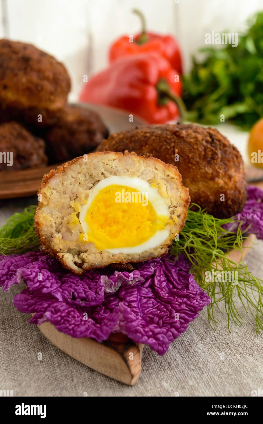 Meat mini-rolls (cutlet) with boiled egg. Close up Stock Photo - Alamy