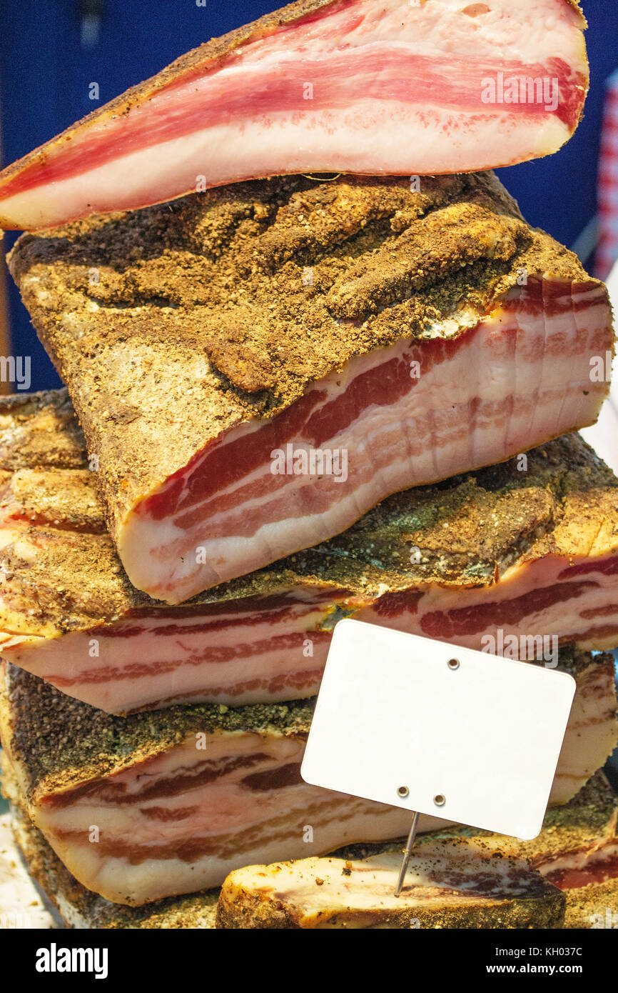 Bacon assortment at the store - with tag Stock Photo - Alamy