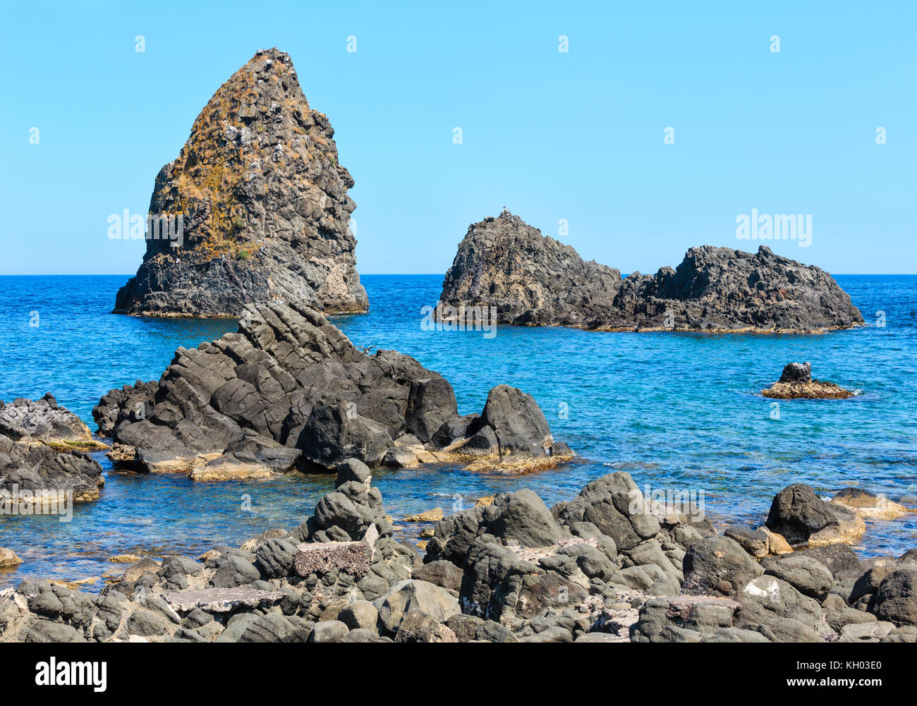 Cyclopean Coast and the Islands of the Cyclops on Aci Trezza town ...