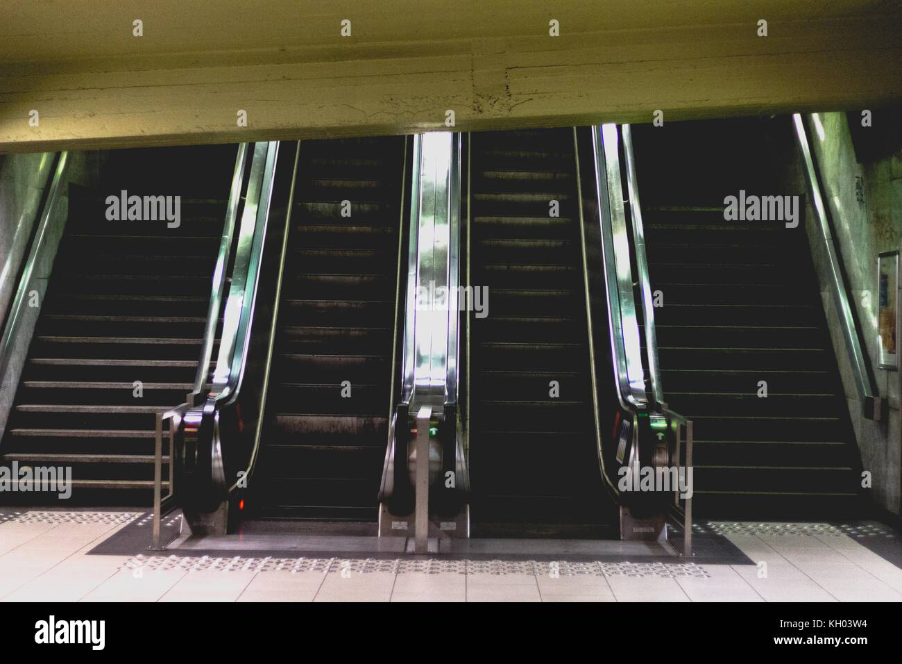 Escalator stairs on a train underground station Stock Photo - Alamy