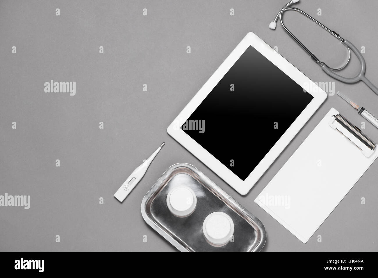 Top view of doctor desk table with stethoscope and medical items. Flat ...