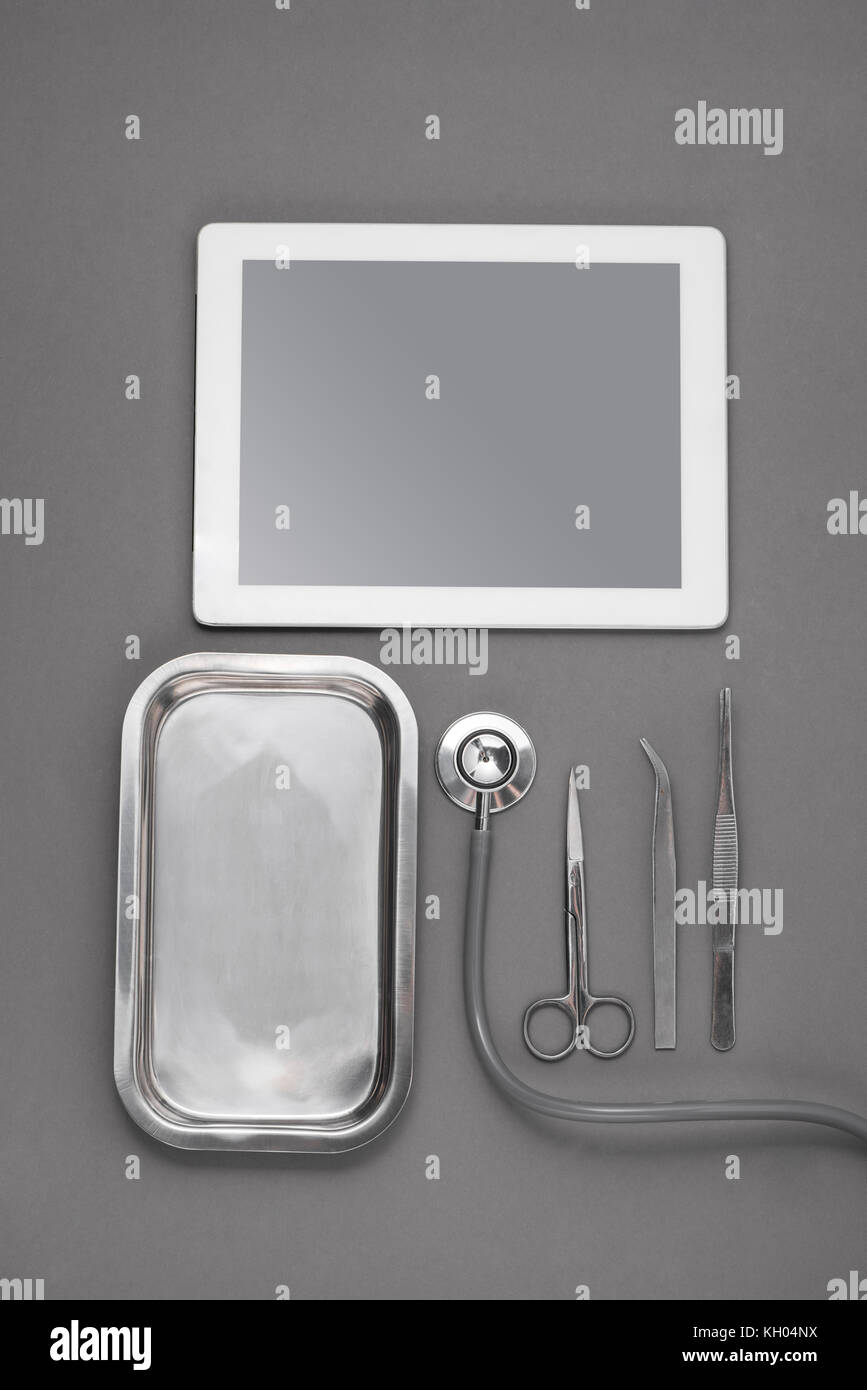 Top view of doctor desk table with stethoscope and medical items. Flat ...