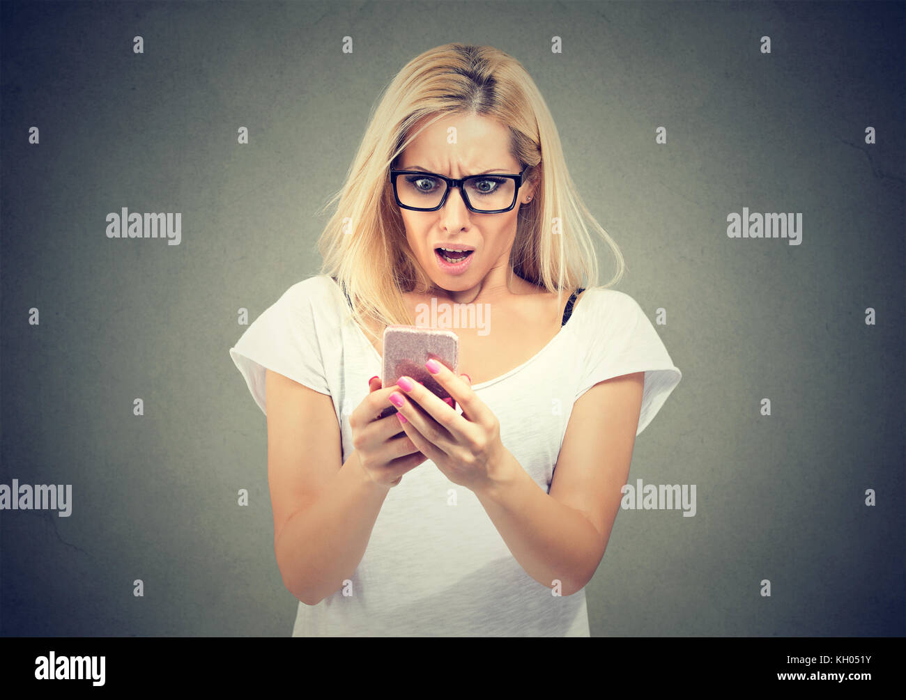 Girl text message shock hi-res stock photography and images - Alamy