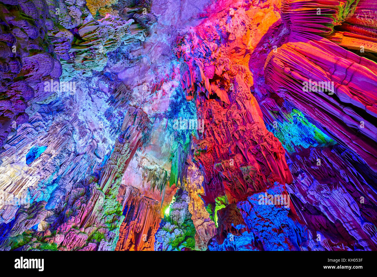 The Reed Flute Cave, natural limestone cave with multicolored lighting ...