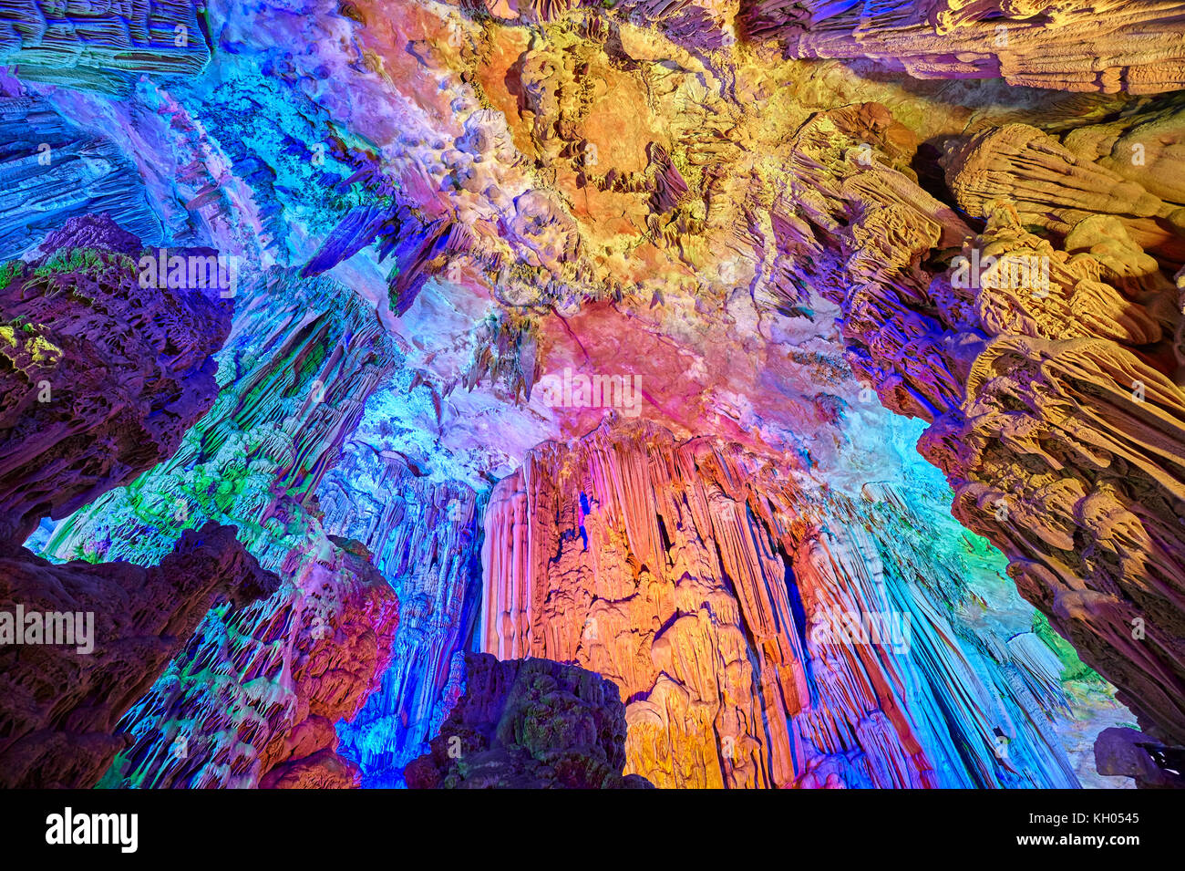 The Reed Flute Cave, natural limestone cave with multicolored lighting ...