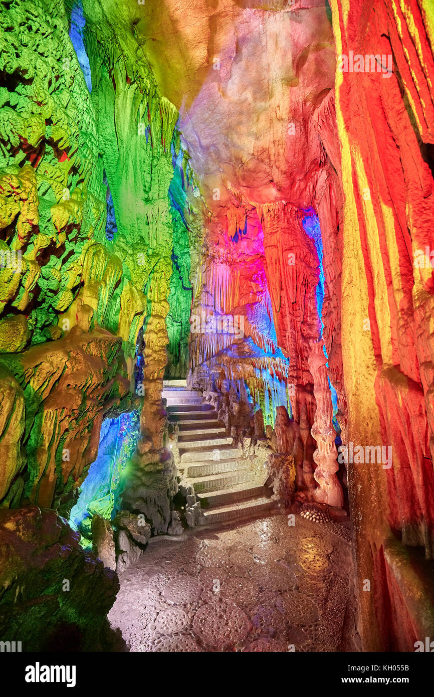 Stone stairs in Reed Flute Cave, natural limestone cave with ...