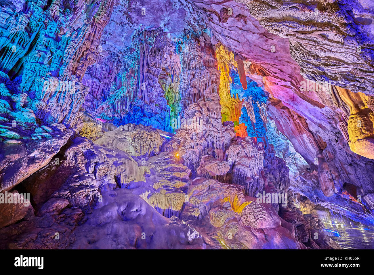 The Reed Flute Cave, natural limestone cave with multicolored lighting ...